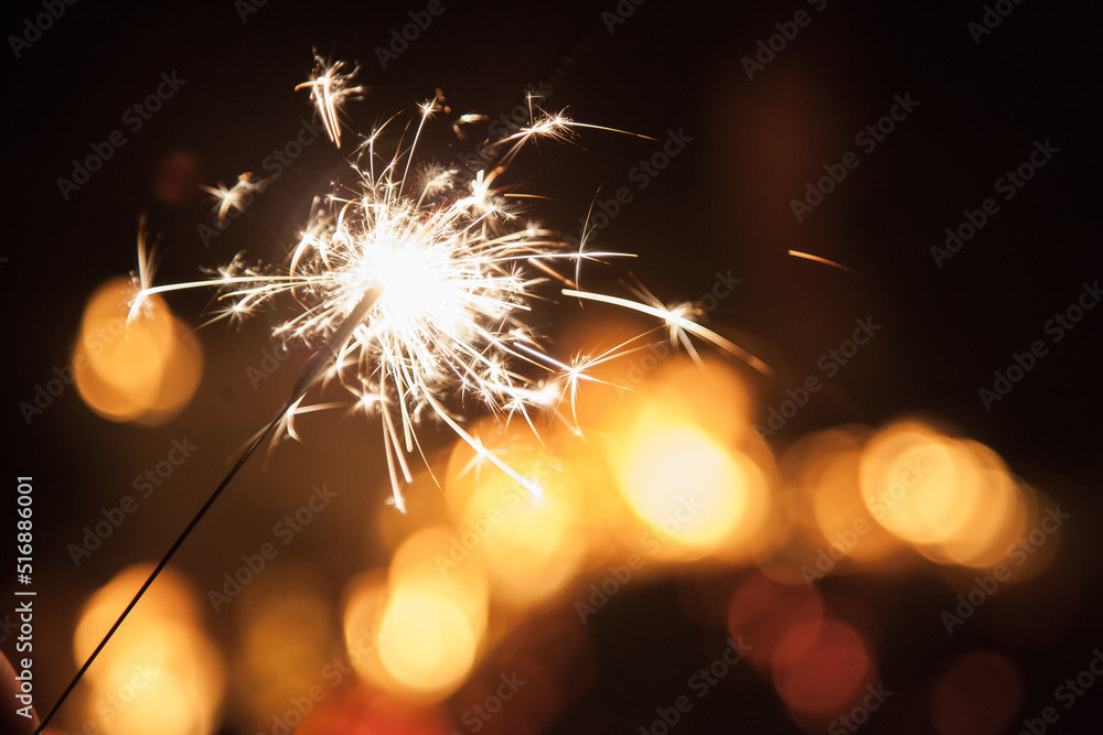 Sparkler shining in the darkness on a bonfire night Stock Photo | Adobe ...