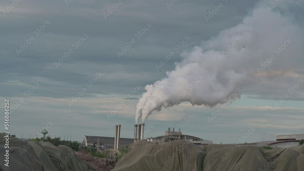 4K-Smoke from the sugar factory or sugar cane industry.Air pollution ...