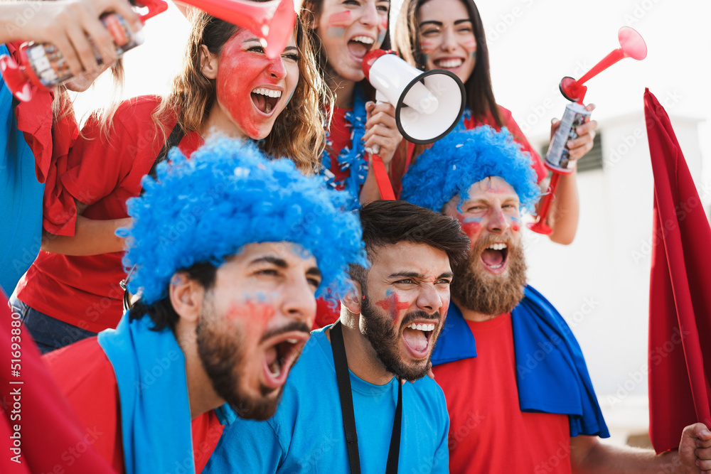 Crazy sport fans screaming while supporting their football team - Focus ...