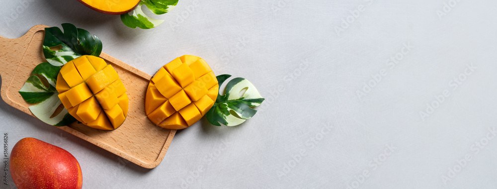 Mango background design concept. Top view Diced fresh mango fruit on ...