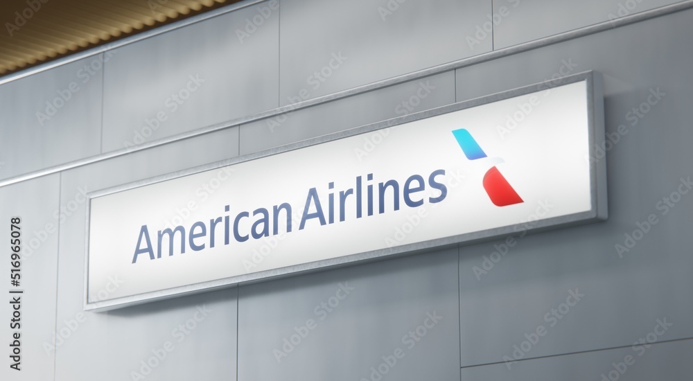 American Airlines logo on illuminated airport sign. Editorial 3D ...