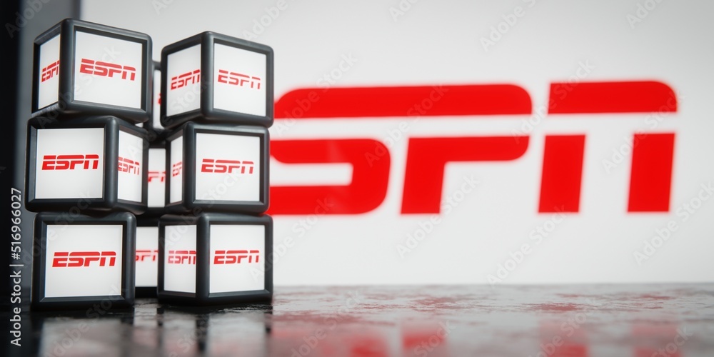 Stacked digital blocks displaying ESPN logo against blurred backdrop ...