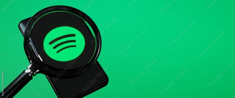 Spotify logo on smartphone under magnifying glass. Editorial ...