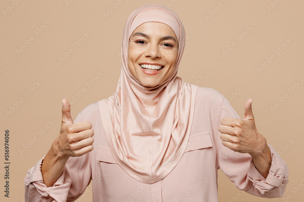 Young fun arabian asian muslim woman she wear abaya hijab pink clothes ...
