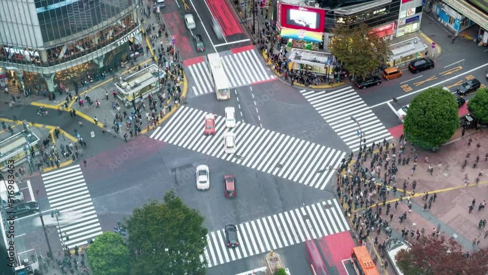 Above of traffic and thoroughfare with crowded people crossing and car ...