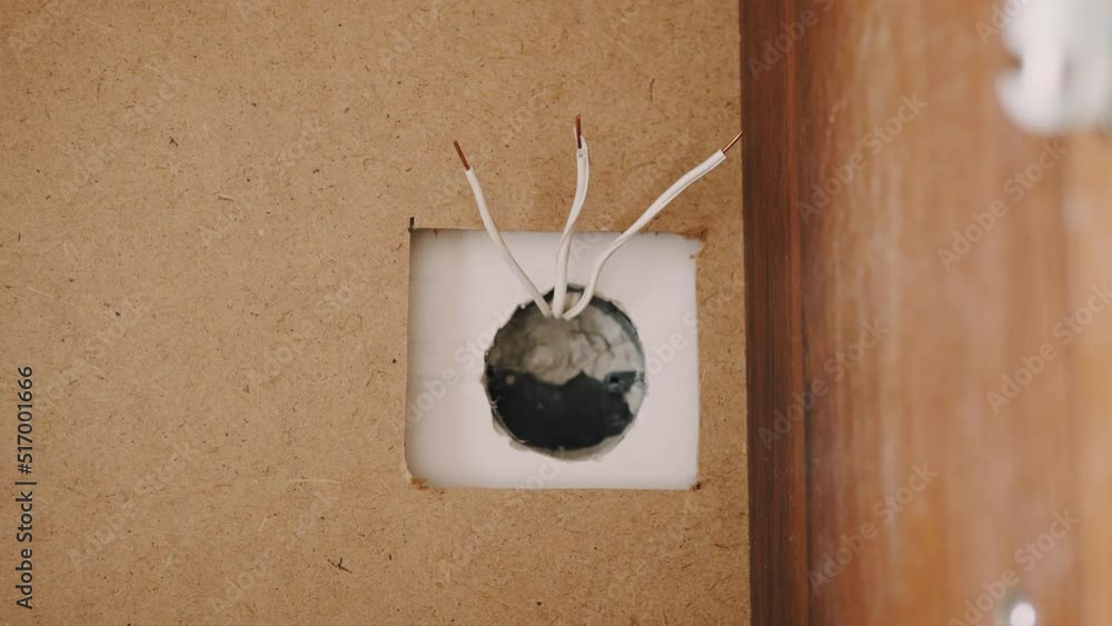 Installation of a kitchen hood, renovation in a new house, a hole with ...