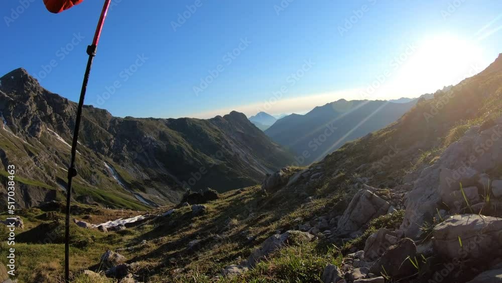 landscape in the mountains, person hiking into sunrise, healthy fresh ...
