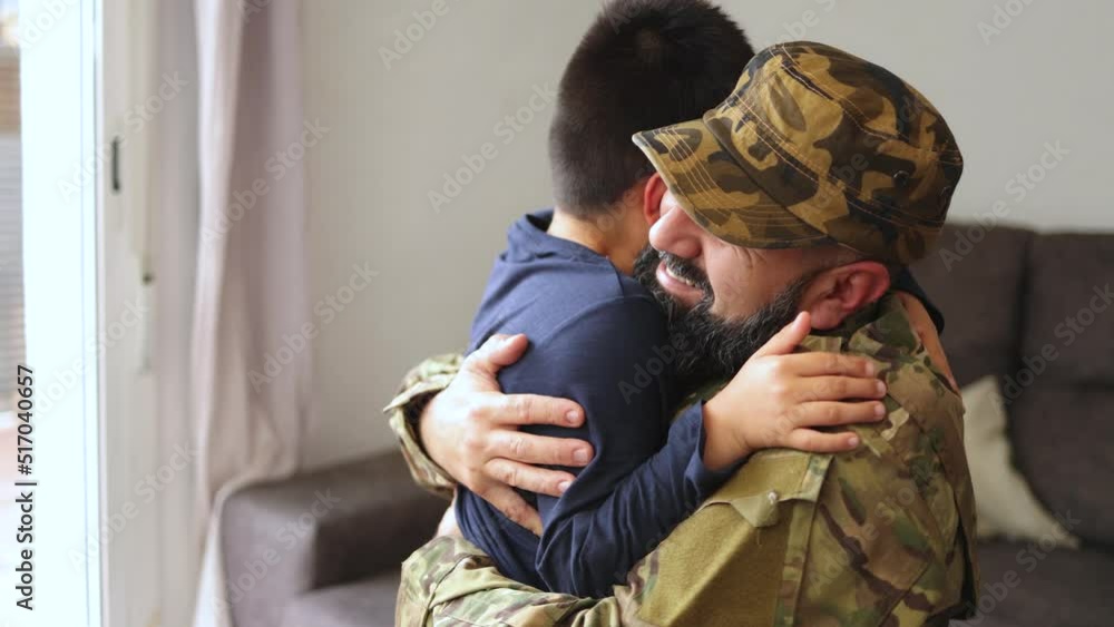 Veteran soldier greeting and hugging his son reunited after US army ...