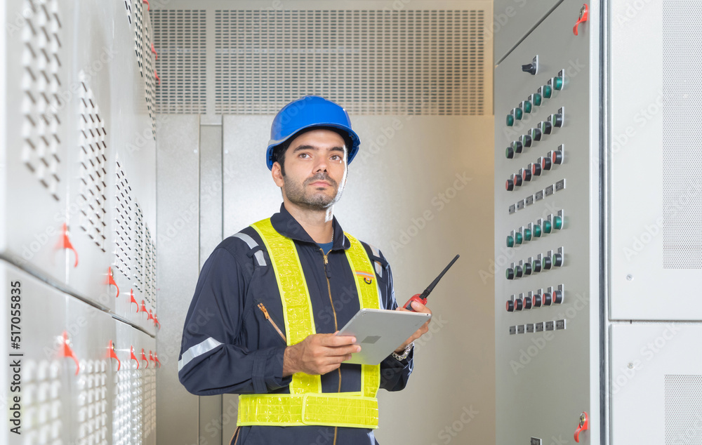 An engineer man or worker, people working in electrical room. Power ...
