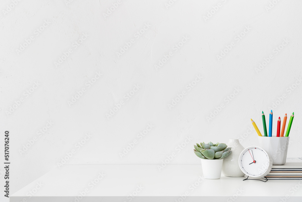 Desk with school supplies. Stock Photo | Adobe Stock