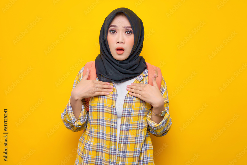 Confused young Asian Muslim woman student in casual clothes and ...