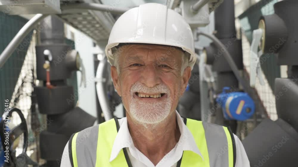 An old elderly engineer man or worker, people working in industry ...