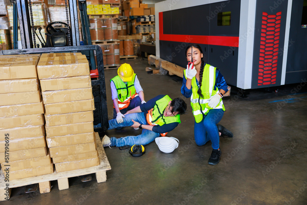 First Aid and safety first. Engineering talking on walki talki radio to ...