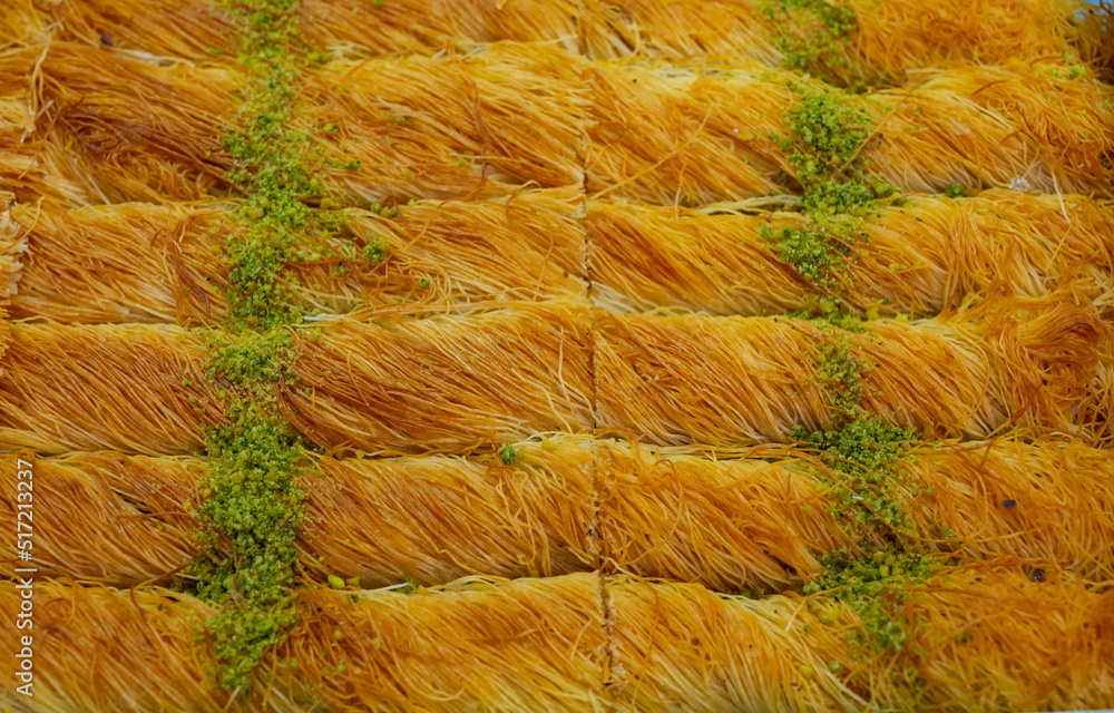 Turkish or arabic sweet dessert, baklava burma kadayif made from filo ...