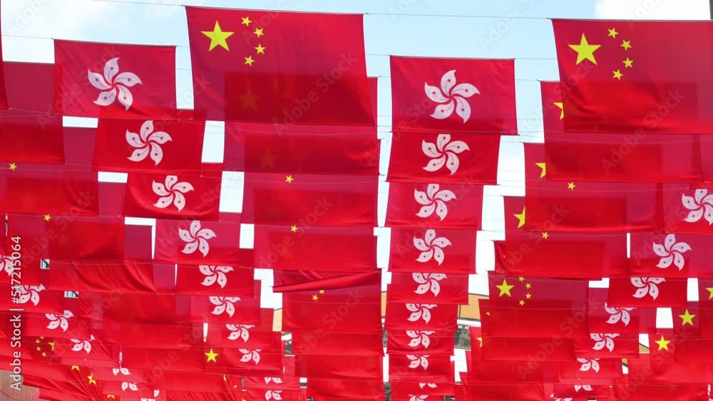 Flags of the People's Republic of China and the Hong Kong SAR are ...