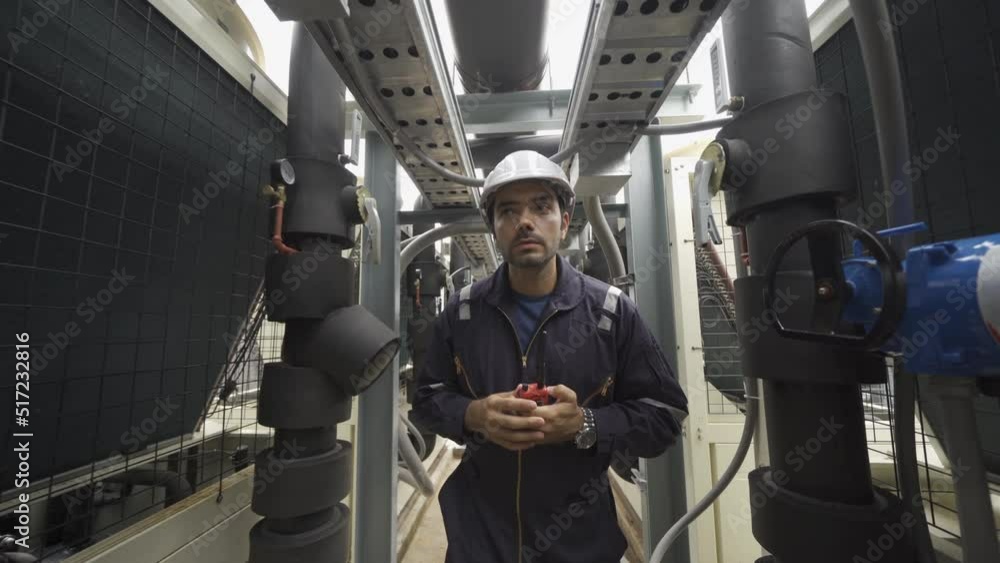 An engineer man or worker, people working in industry factory. Chiller ...