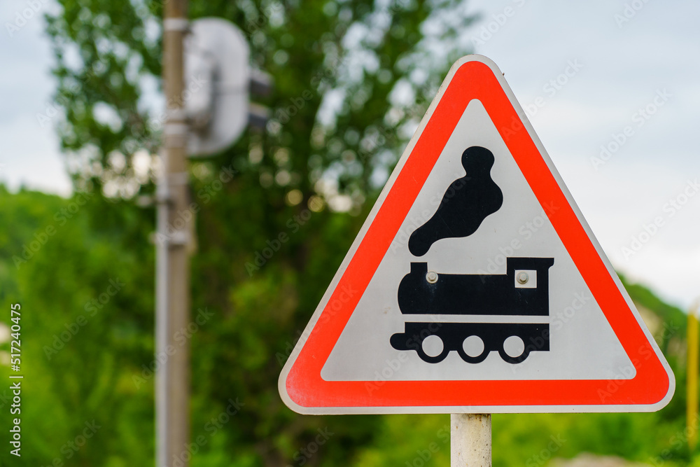 Road sign railway crossing without barrier close-up. Background with ...
