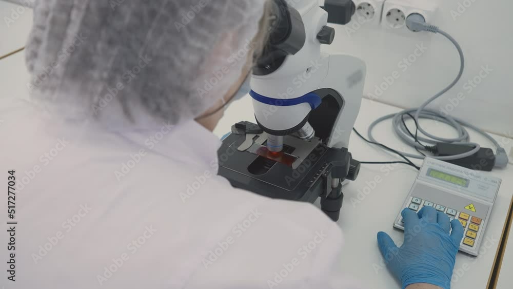 Nurse testing the blood samples at the modern laboratory. Testing the ...