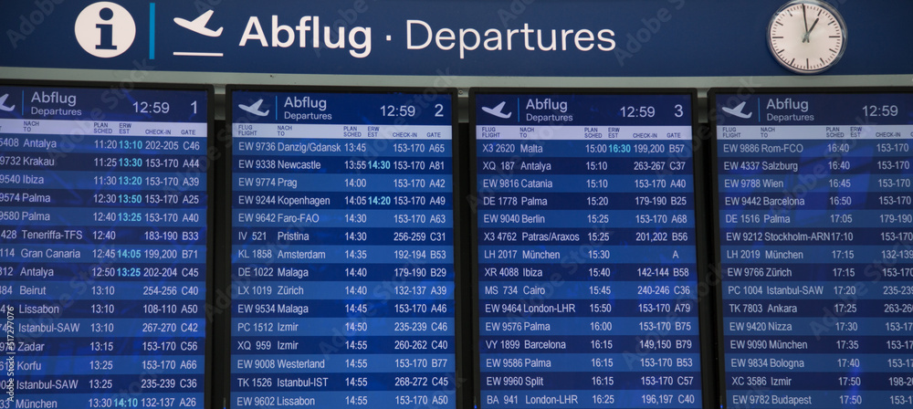 flight information board at airport Stock Photo | Adobe Stock