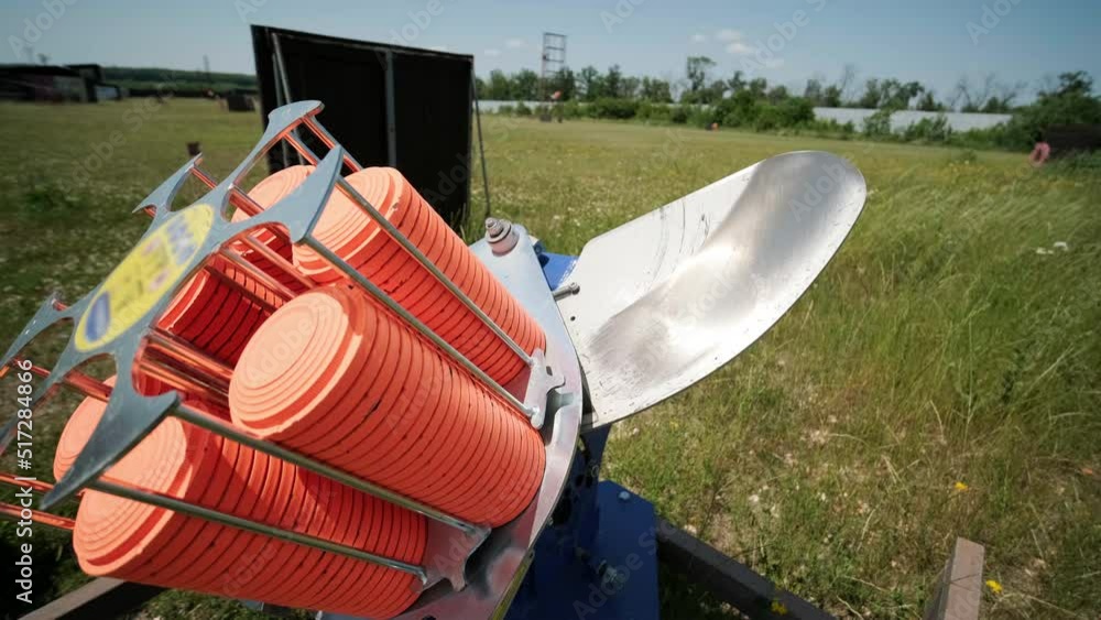 Slow Motion Clay Pigeon from the Side. Bench shooting on plates. V-log ...