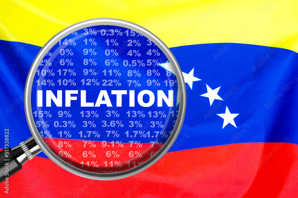 Magnifying glass focused on the word inflation on Venezuela flag ...