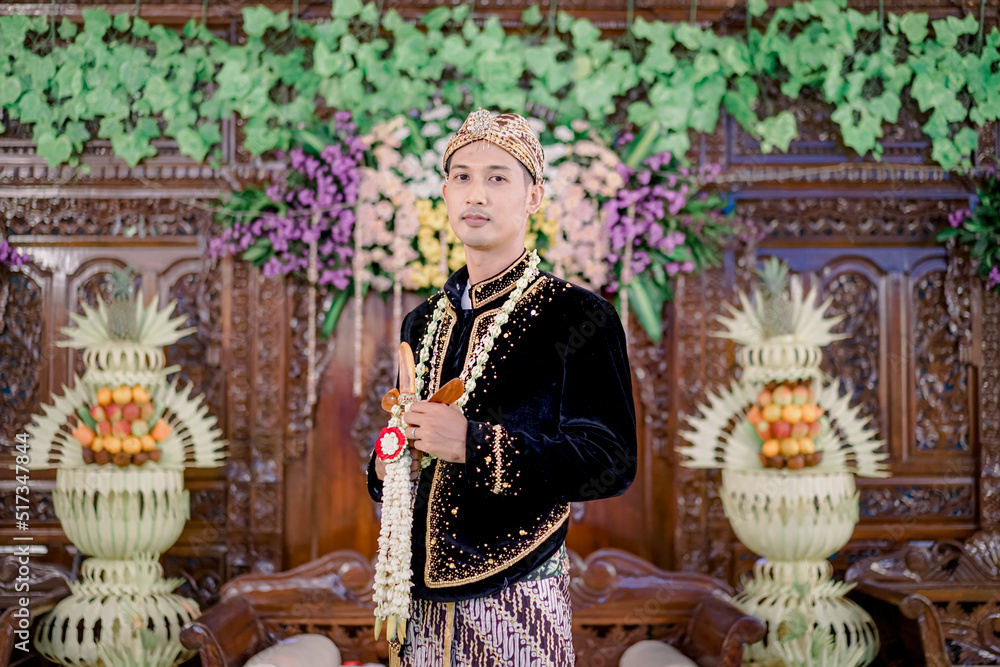 The groom wears Javanese traditional clothes, black and blangkon ... The groom wears Javanese traditional clothes, black and blangkon ...