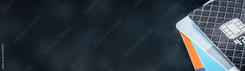 Credit cards stack on dark background with copyspace Stock Photo ...