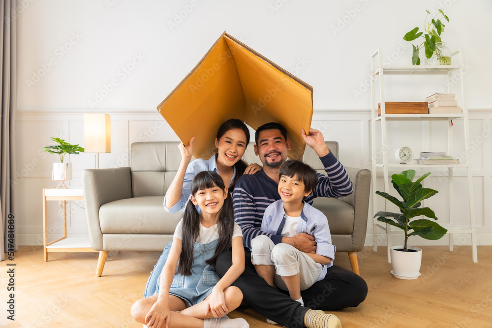 Young Asian family. mother father and children in new home.Family New ...
