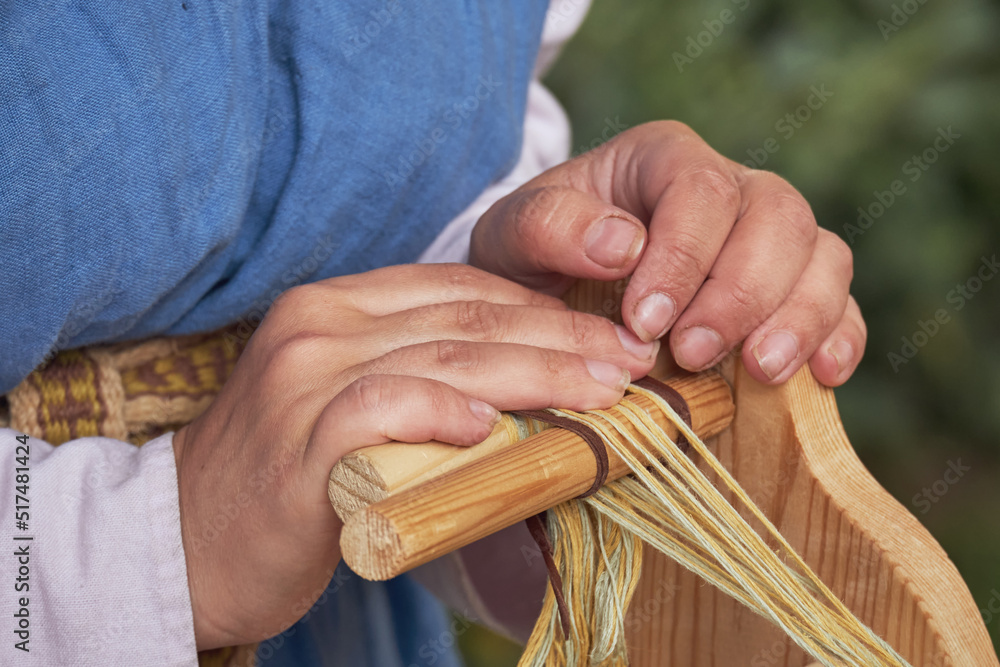 An ancient Roman woman makes yarn and sews from vintage wool ...