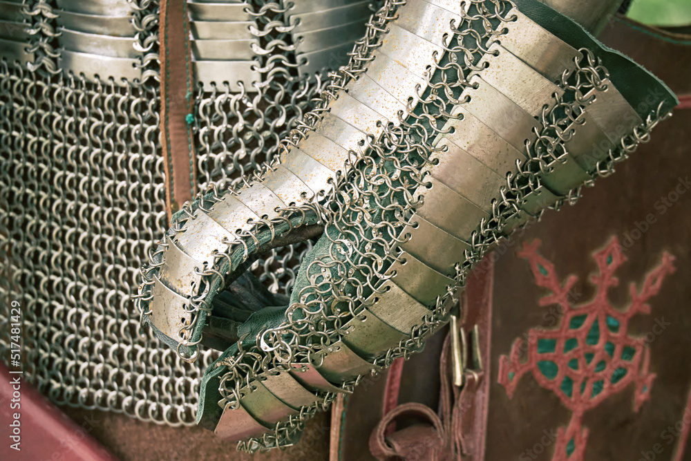 Vintage armor, retro chain mail and a protective metal glove. Ancient ...