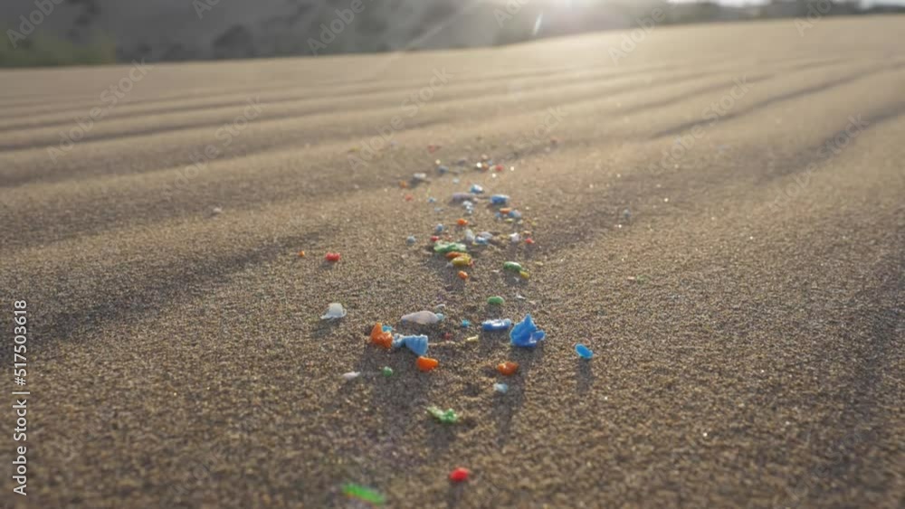 pieces of microplastic on the finger. primary and secondary ...