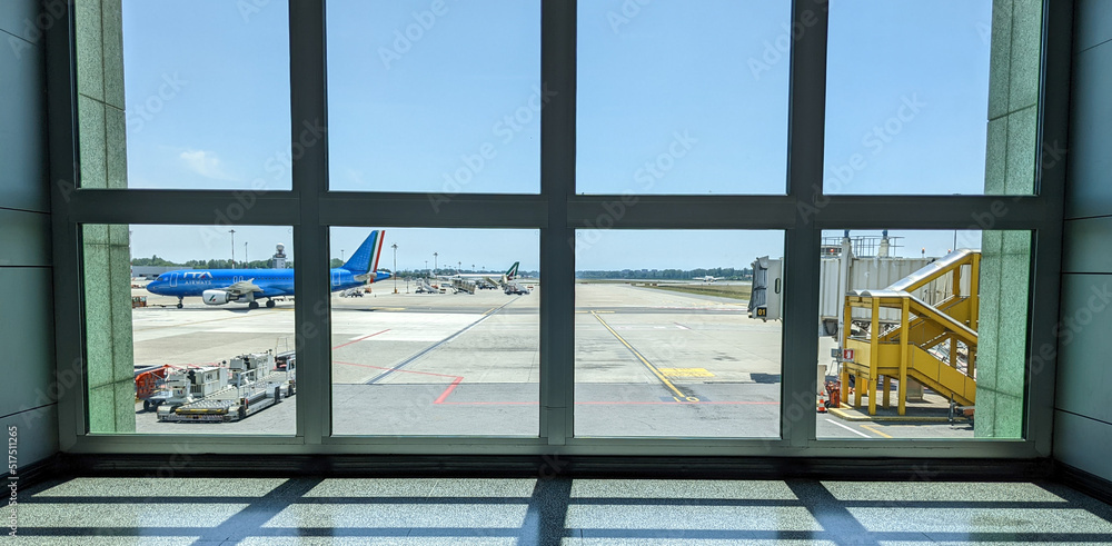 LINATE AIRPORT, ITALY - CIRCA JUNE 2022: airport operations in the ...