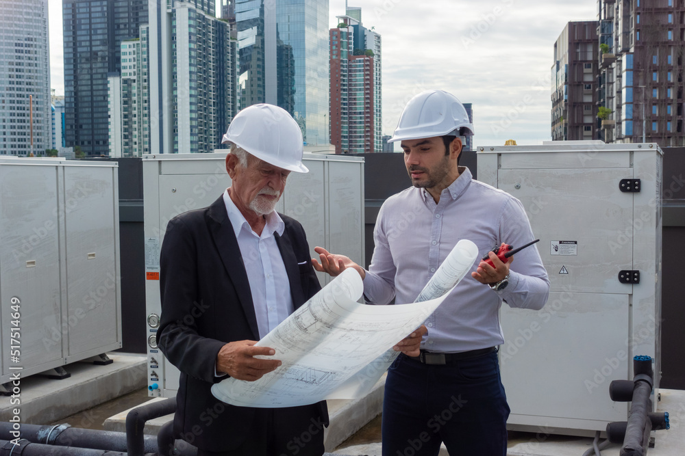Engineer under checking the industry chilled water fan coil unit air ...