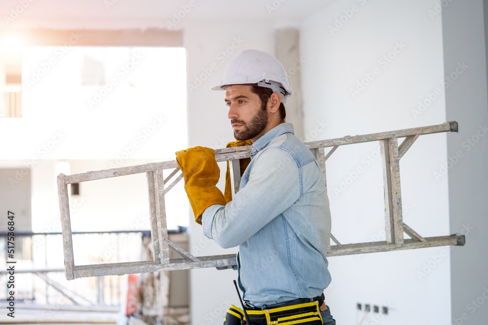 Construction worker working on building site,House reconstruction ...