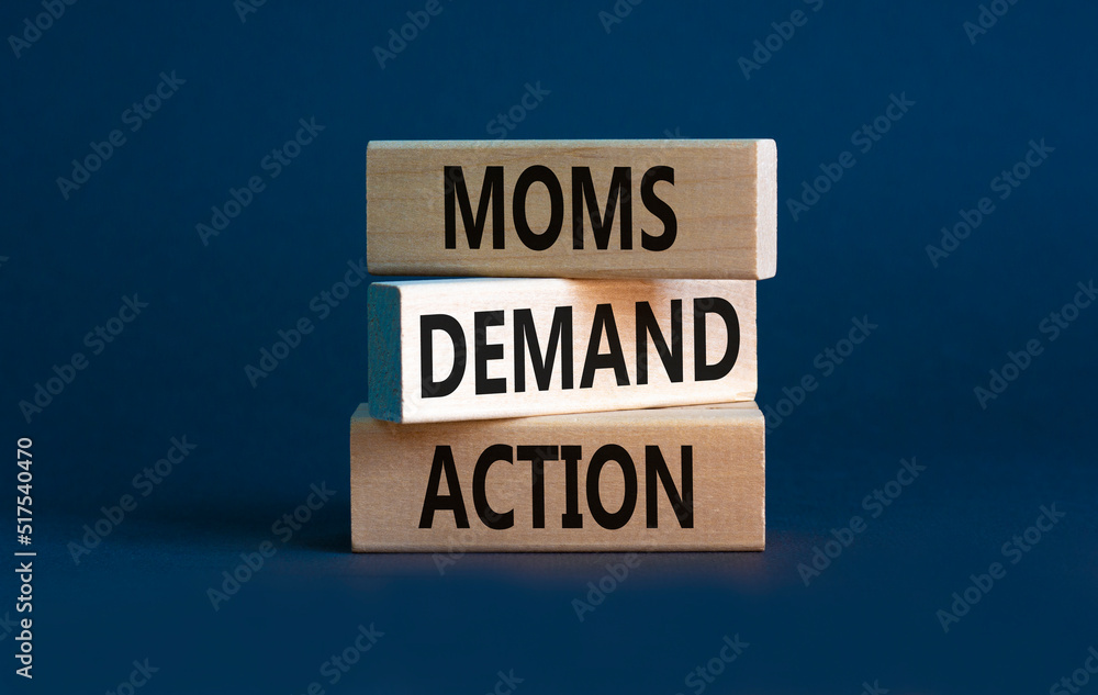 Moms demand action symbol. Concept words Moms demand action on wooden ...