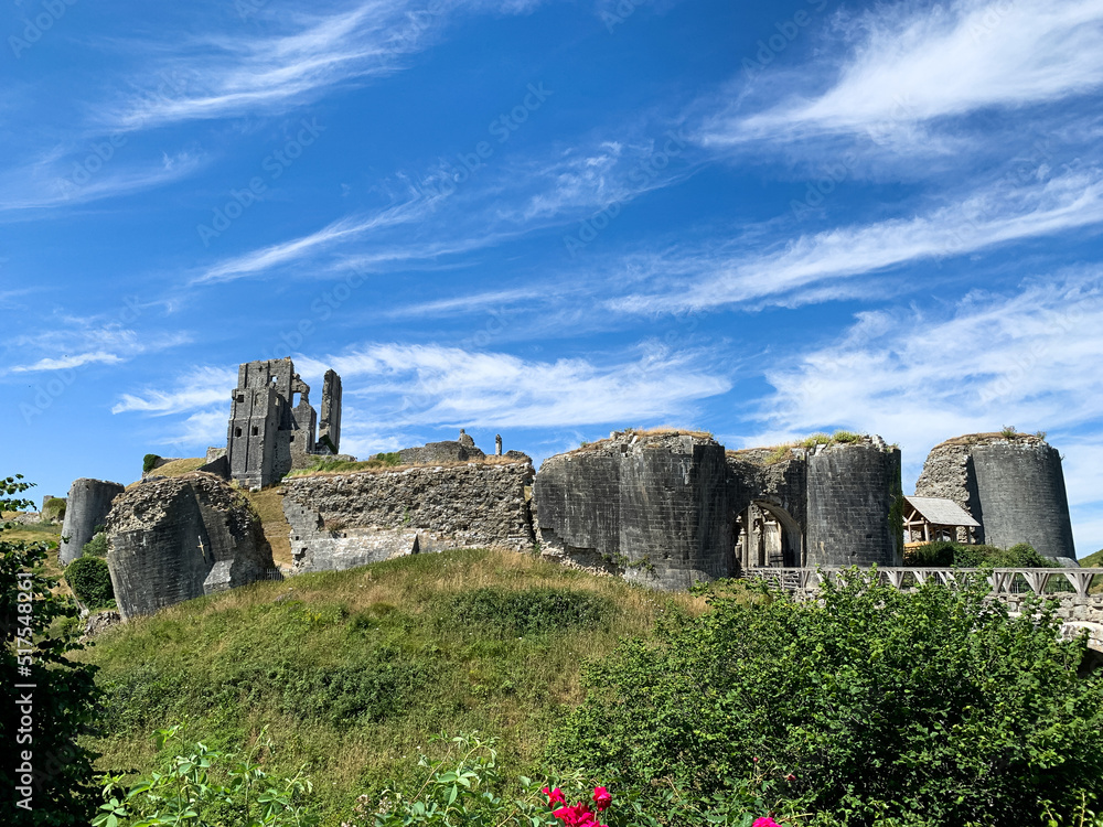 Medieval ruins of Corfe Castle sunny summer day panorama Isle Purbeck ...