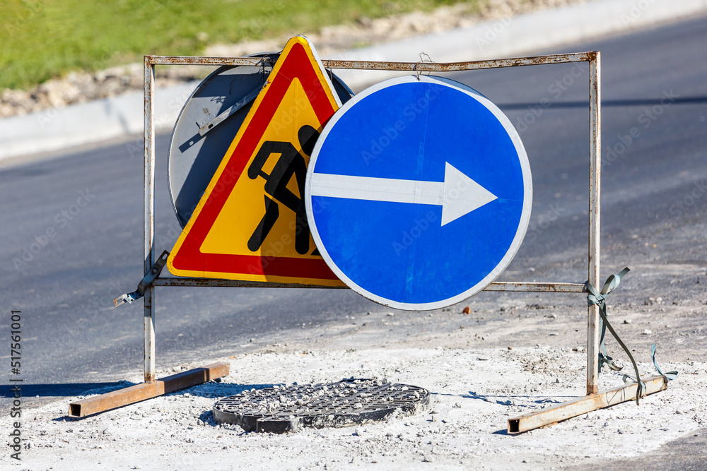 Road signs!Road works with trucks and traffic signs.road works road ...