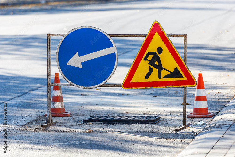 Road signs!Road works with trucks and traffic signs.road works road ...