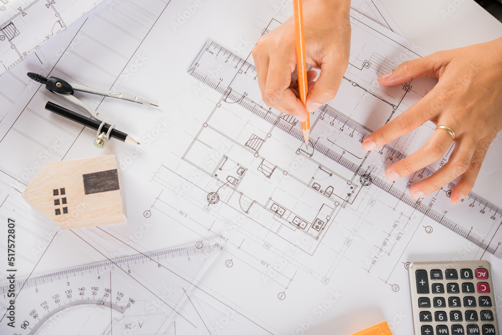 Architectural project workspace. Top view of architect drawing with ...