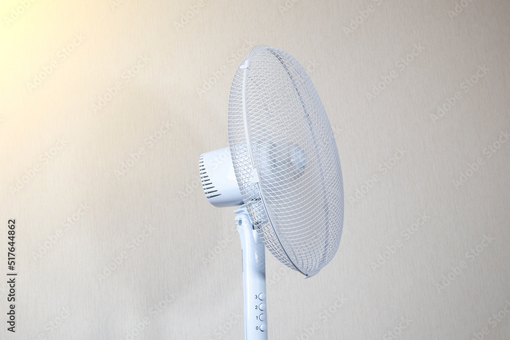 Metal white modern fan or vent..Closeup on working electric floor ...