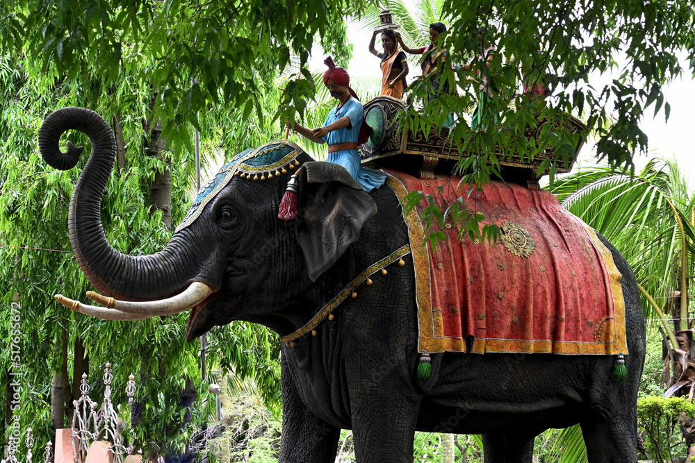 KOLHAPUR, INDIA - JULY 17, 2022: Statue of a decorated elephant with ...