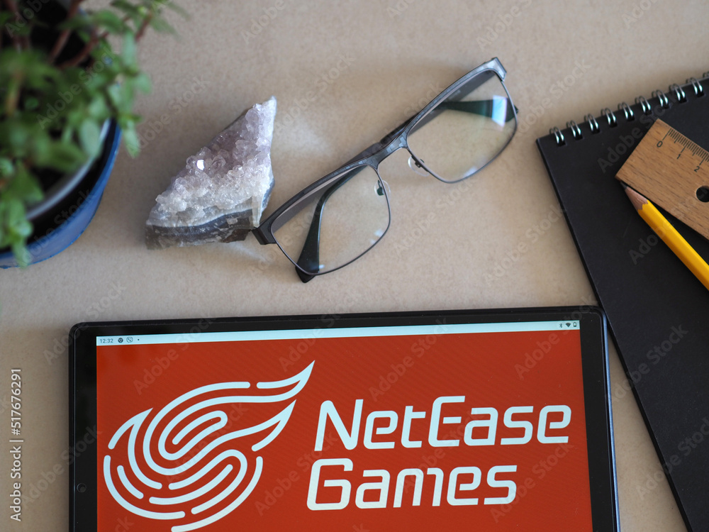 In this photo illustration, NetEase, Inc. logo seen displayed on a tablet. Stock Photo | Adobe Stock
