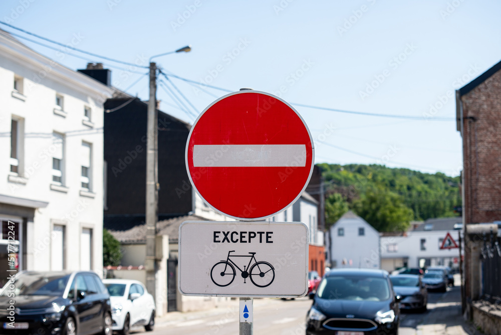 The road is closed red round sign. White brick in red circle road sign ...