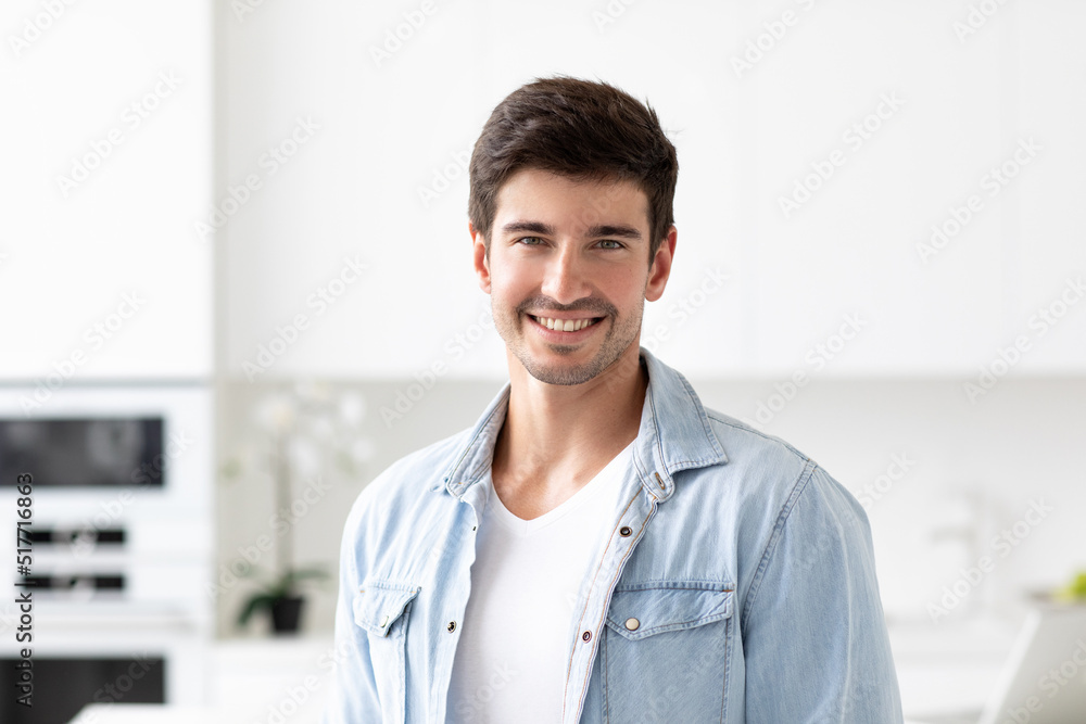 Smiling man in the kitchen. Male lifestyle portrait Stock Photo | Adobe ...