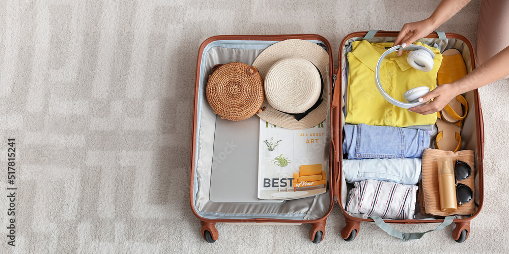 Woman packing suitcase at home, top view. Travel concept Stock Photo ...
