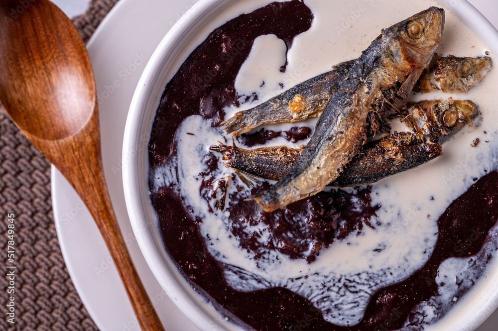 Champorado or tsampurado (topped with Tuyo/dried fish and milk ) is a ...