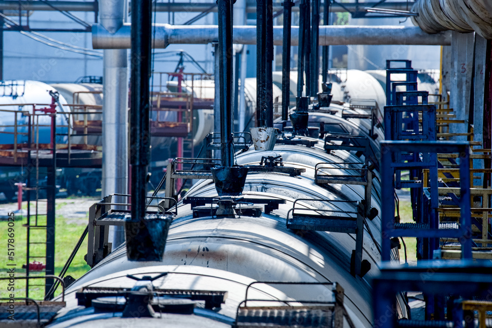 Filling tanks at an oil refinery. Cargo oil transportation in tanks by ...