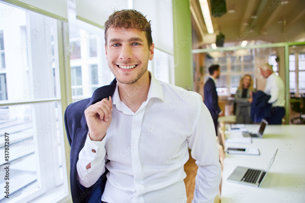 Young businessman as a smiling start-up founder Stock Photo | Adobe Stock