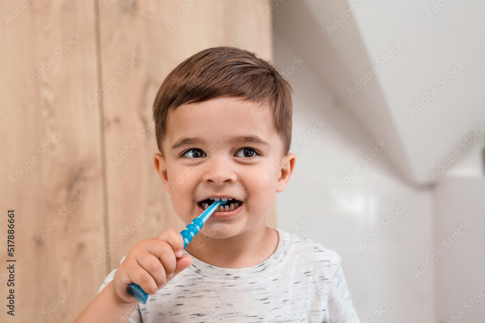 Child brushing teeth. Kids tooth brush and paste. Little funny baby boy ...