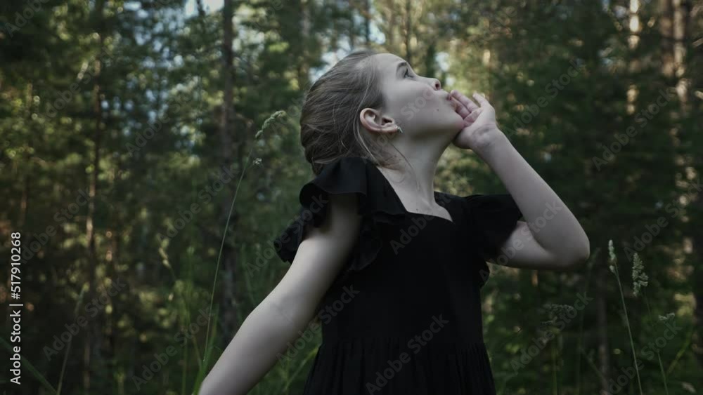 Schoolgirl with long braid lost in dark forest. Stylish teenager ...